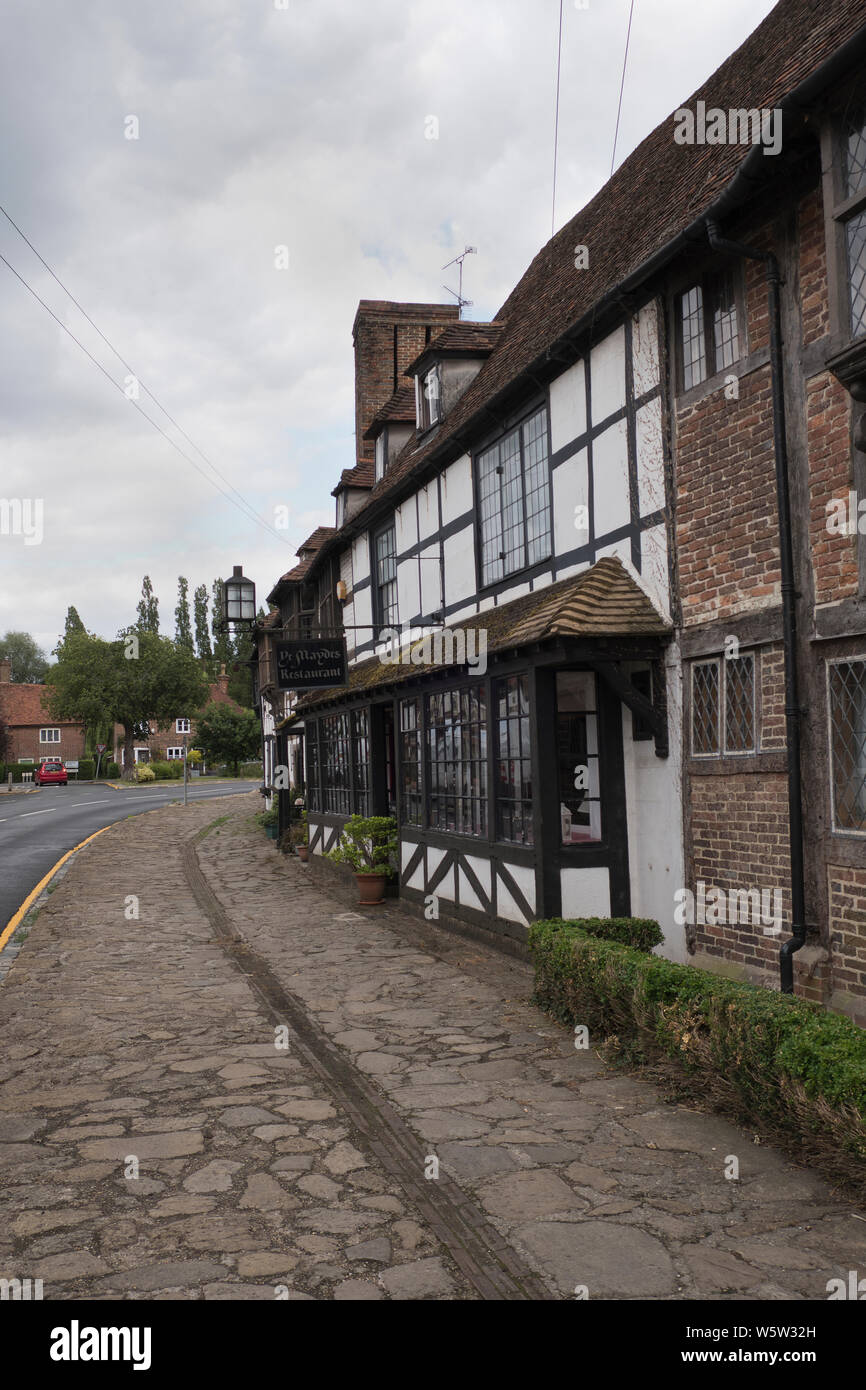 Original 1400s and Tudor buildings and pavement along Biddenden high ...