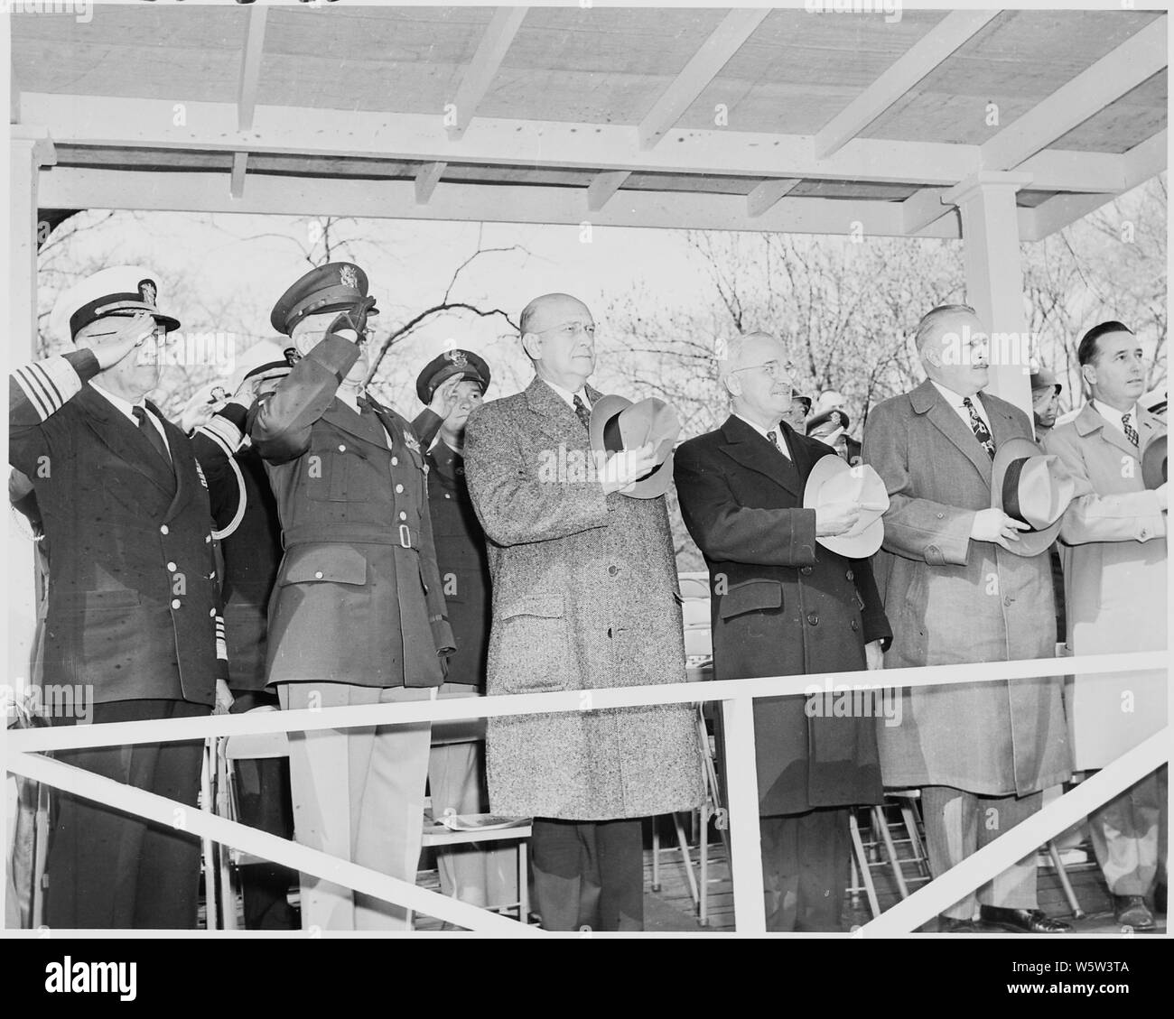 Photograph of President Truman and other dignitaries on the reviewing ...