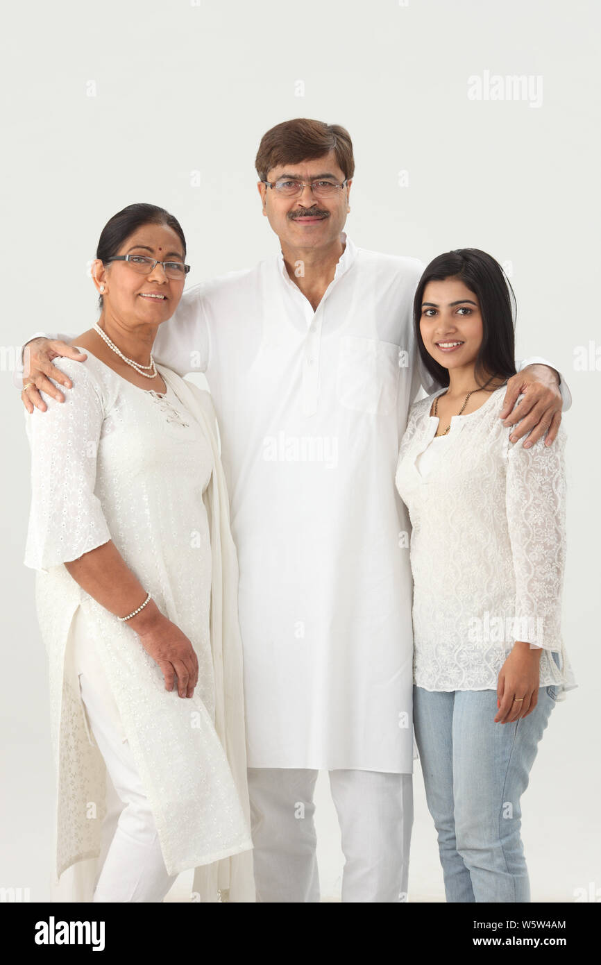 Family standing together Stock Photo - Alamy