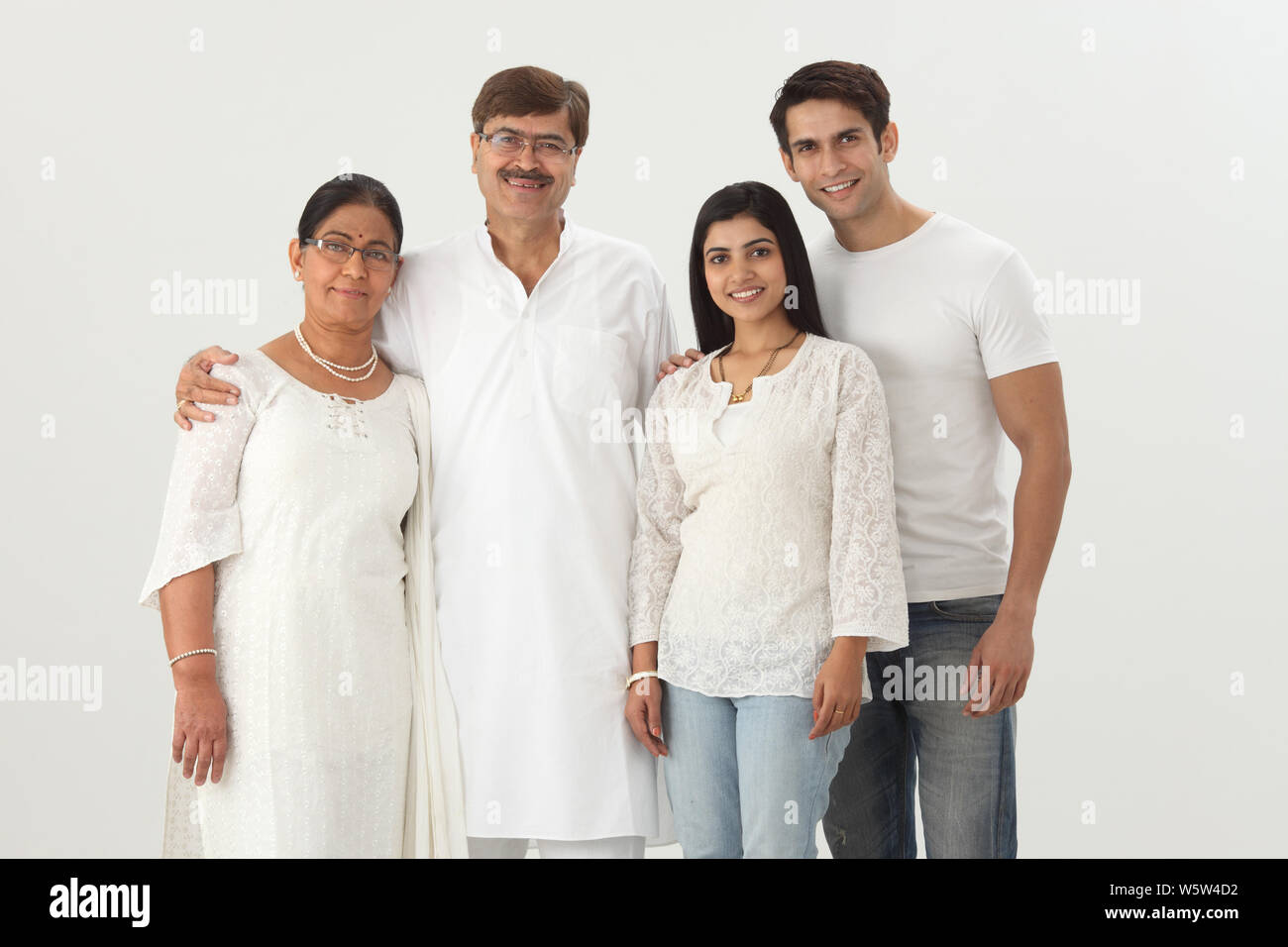 Portrait of a family standing together Stock Photo - Alamy