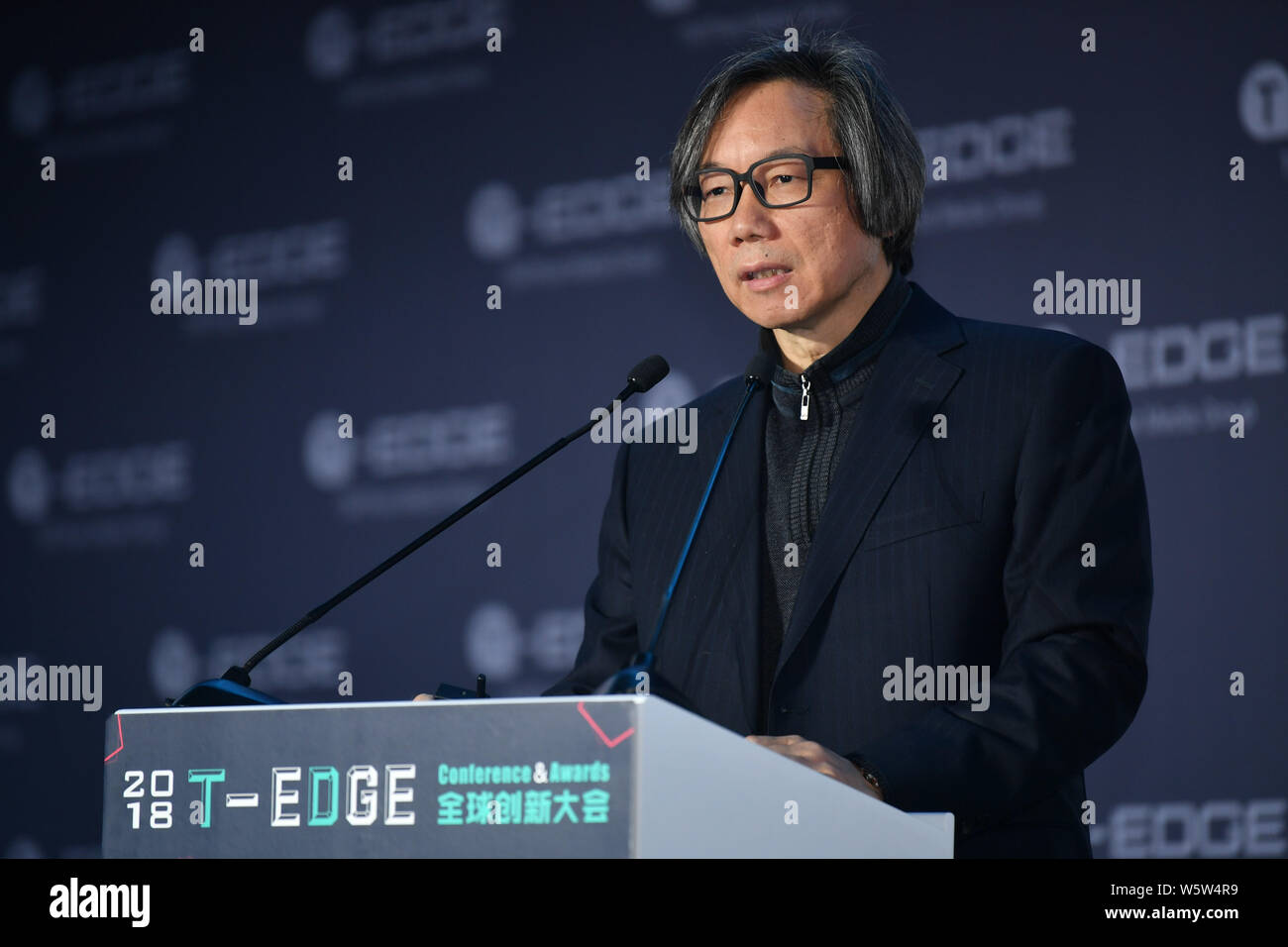 Dai Zigeng, Communist Party-appointed publisher of Beijing News, attends a sub-forum during the ...