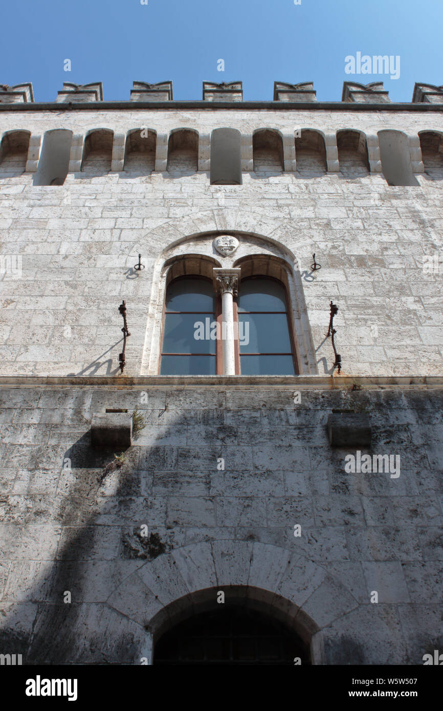 Medieval towering wall of a drawbridge in a castle, italy Stock Photo ...
