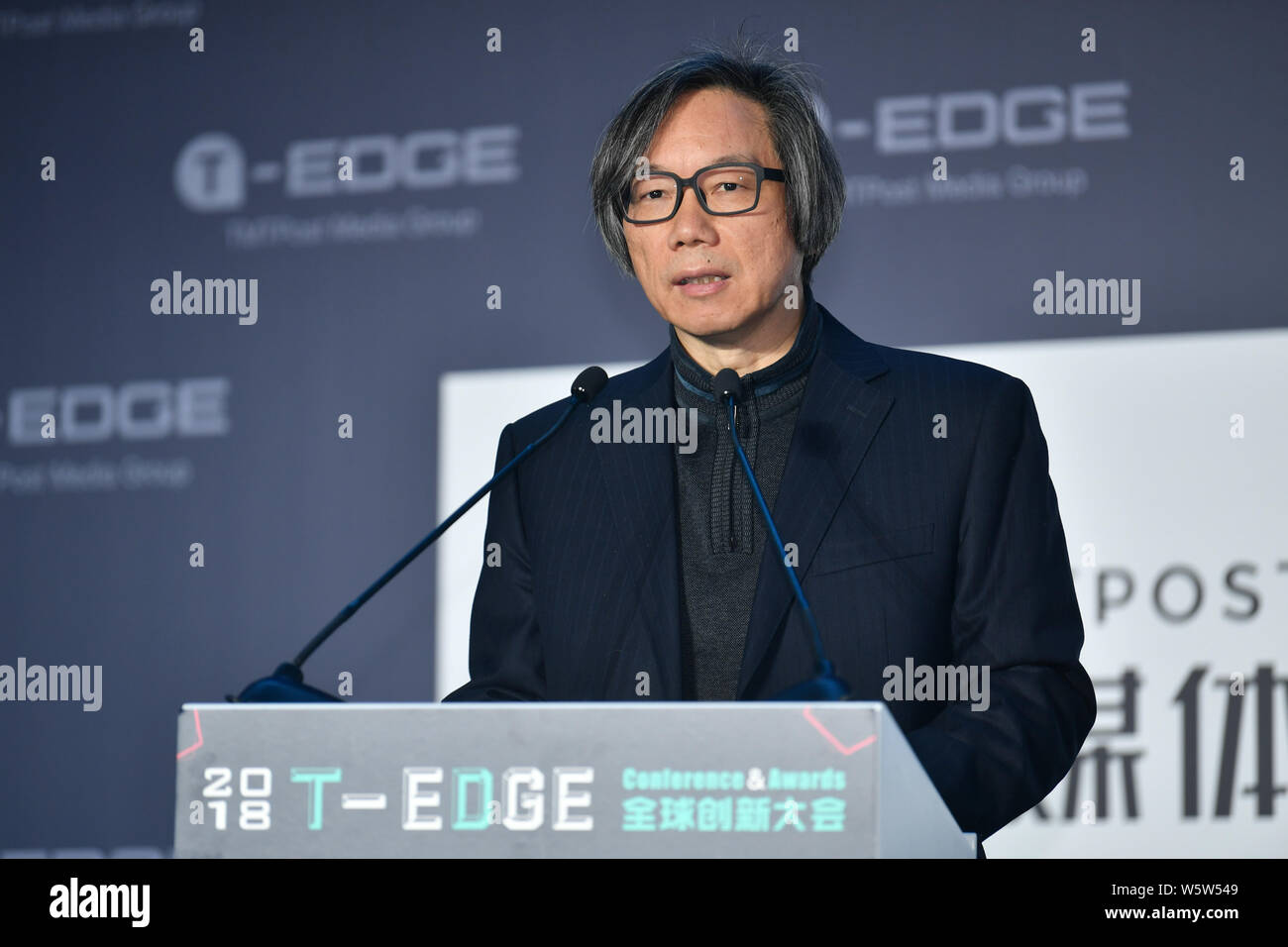 Dai Zigeng, Communist Party-appointed publisher of Beijing News, attends a sub-forum during the ...