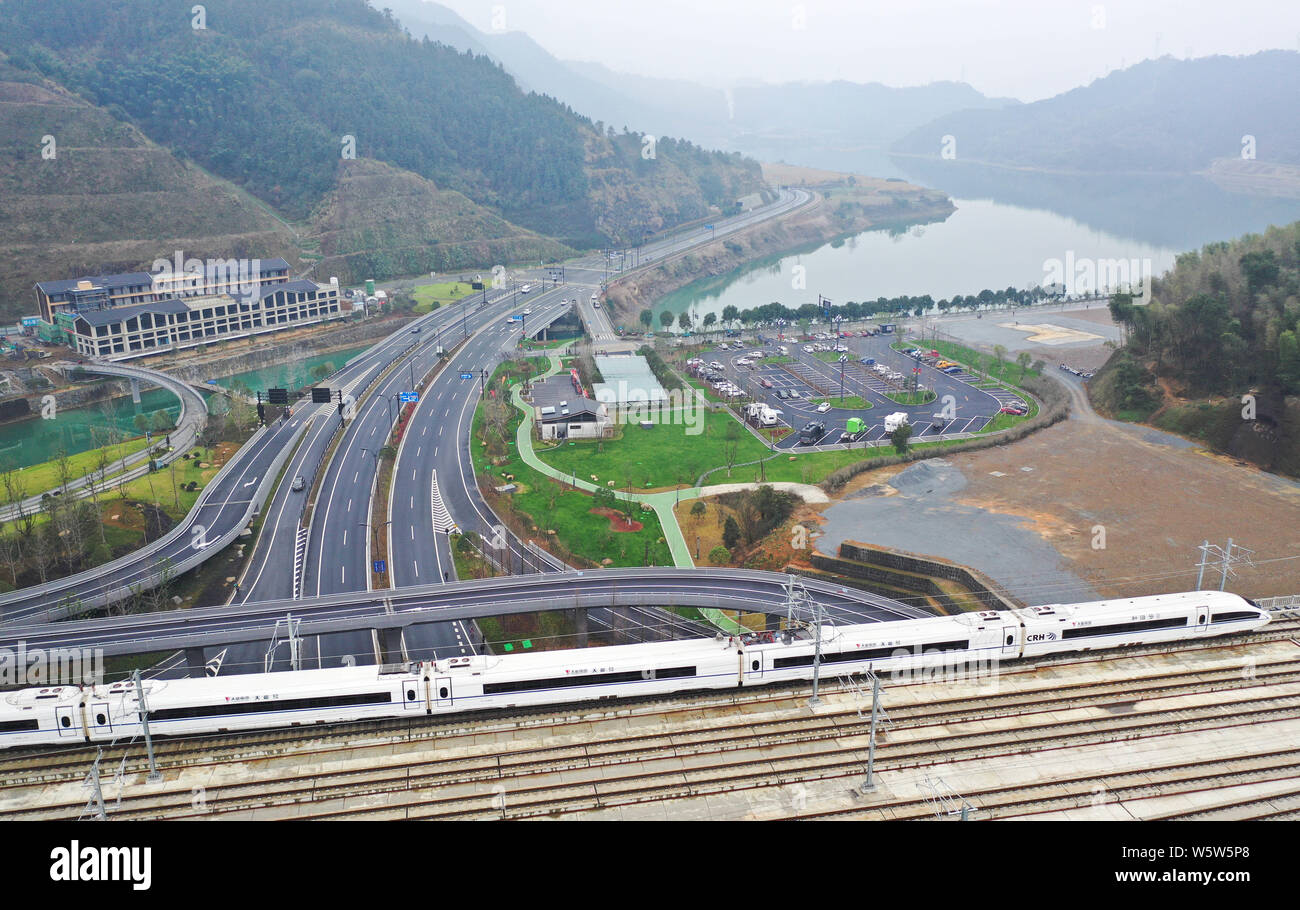 A CRH (China Railway High-speed) bullet train runs on the 265-kilometer ...