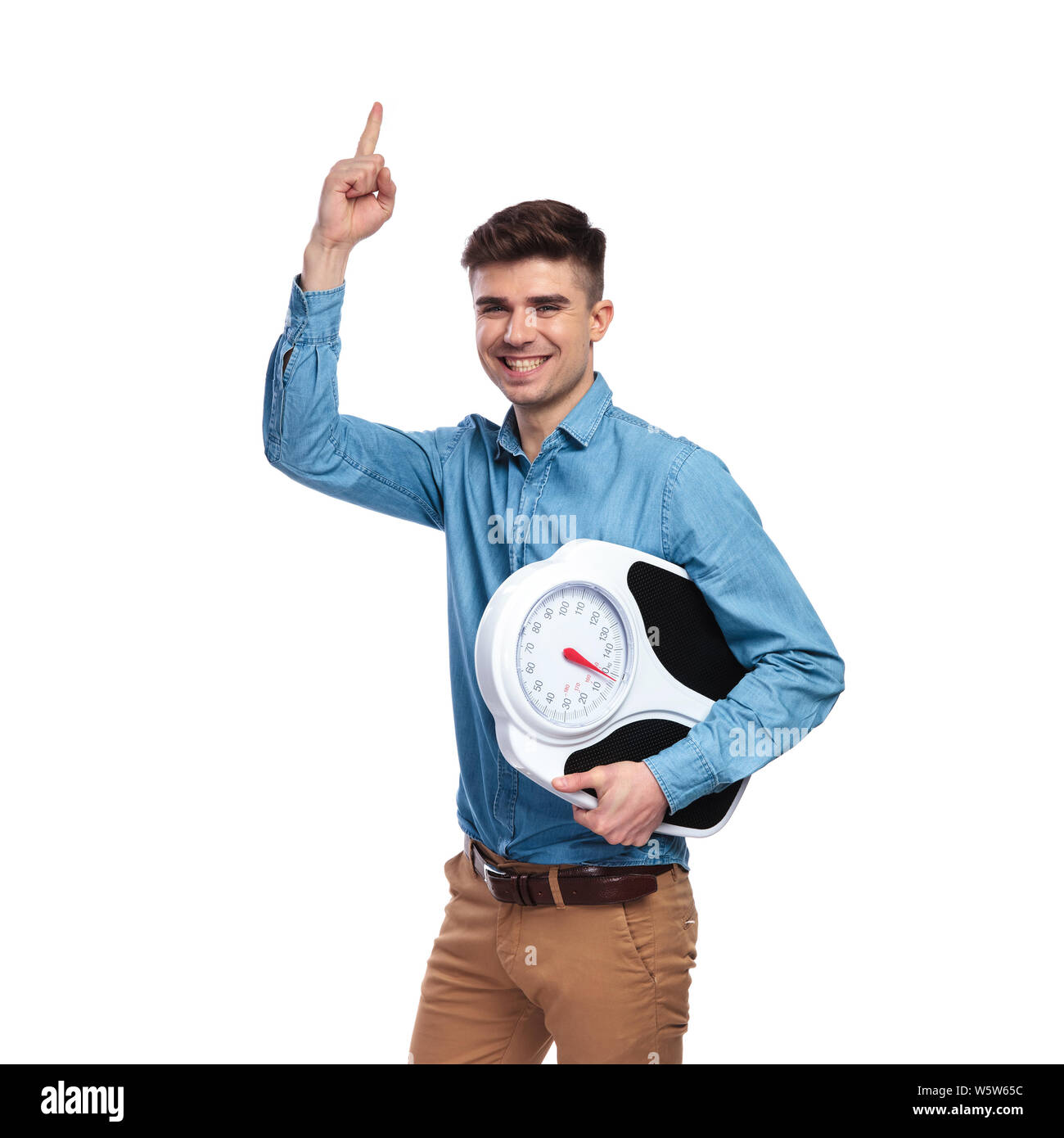 Person standing on scale jeans hi-res stock photography and images - Alamy