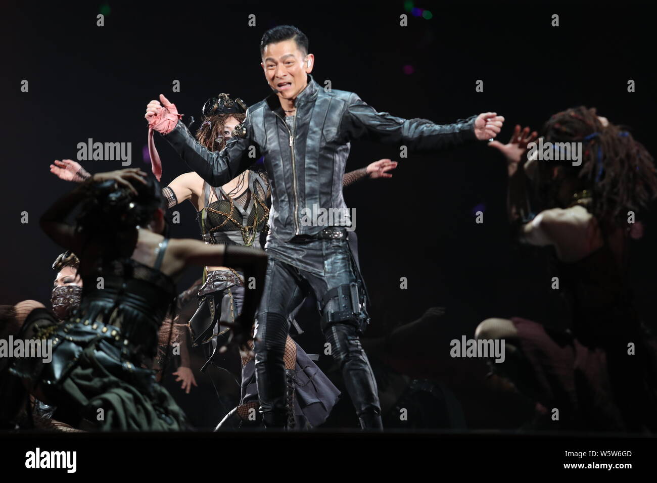 Hong Kong actor and singer Andy Lau Te-wa performs during his concert ...