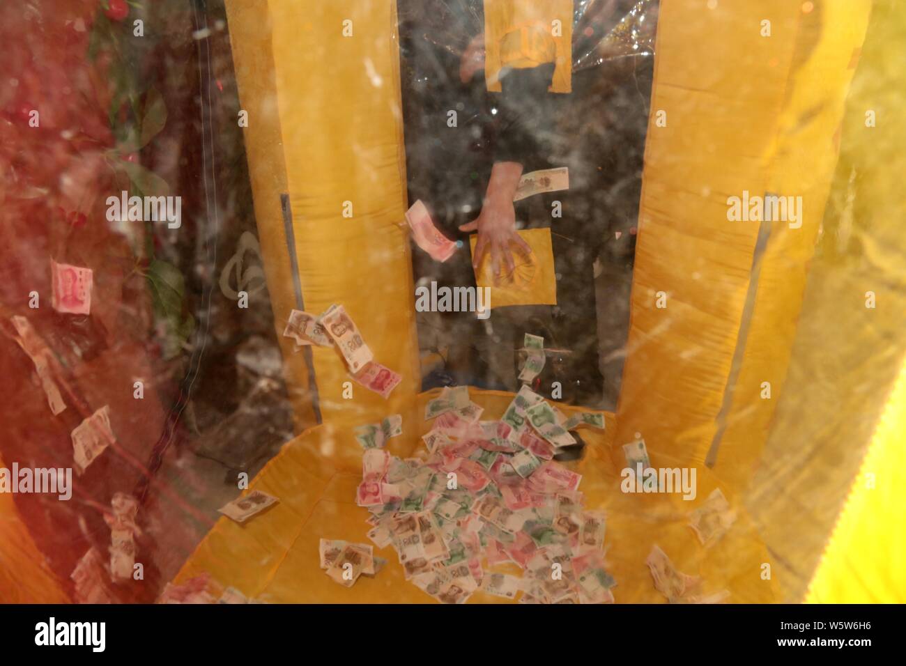 Money grabbing hi-res stock photography and images - Alamy