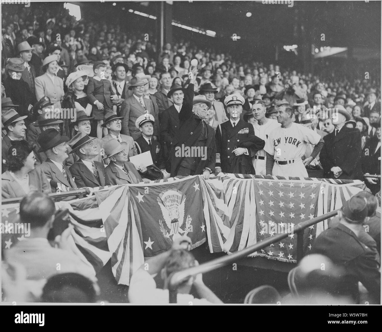 Photograph of President Truman preparing to throw out the first ball of ...