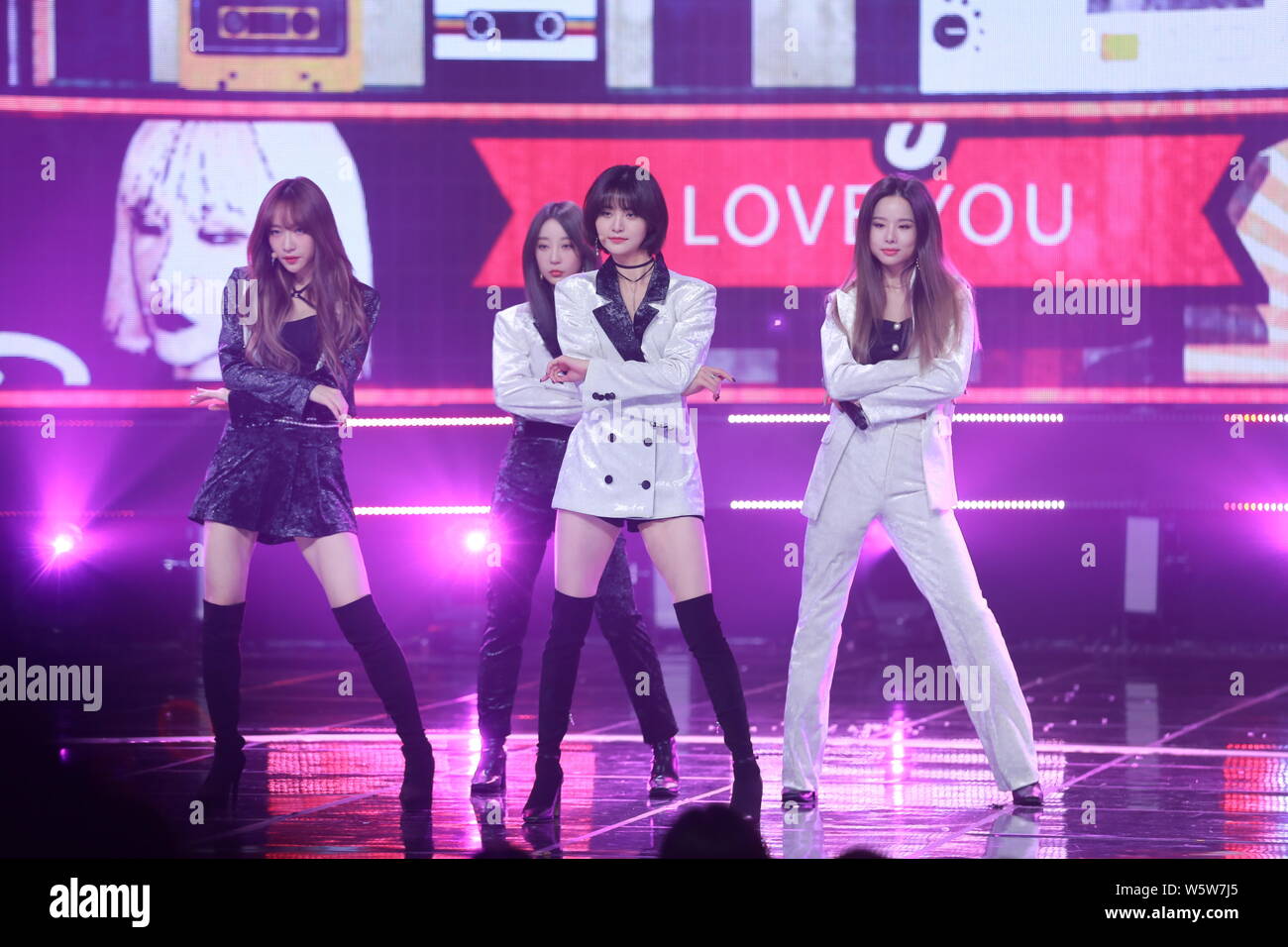 Members of South Korean girl group EXID perform during the filming ...
