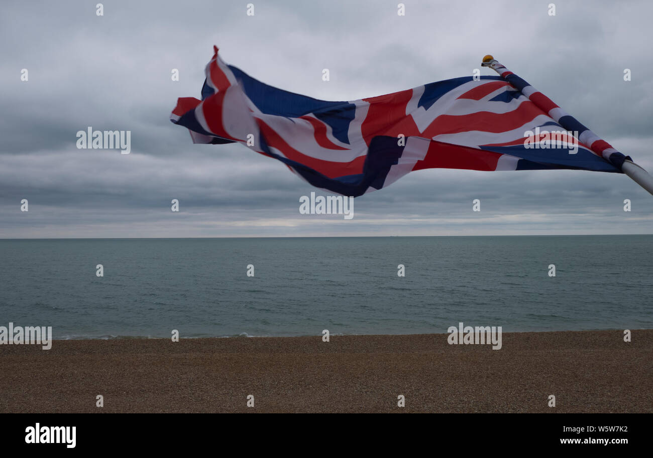 Fluttering flag over the sea hi-res stock photography and images - Alamy