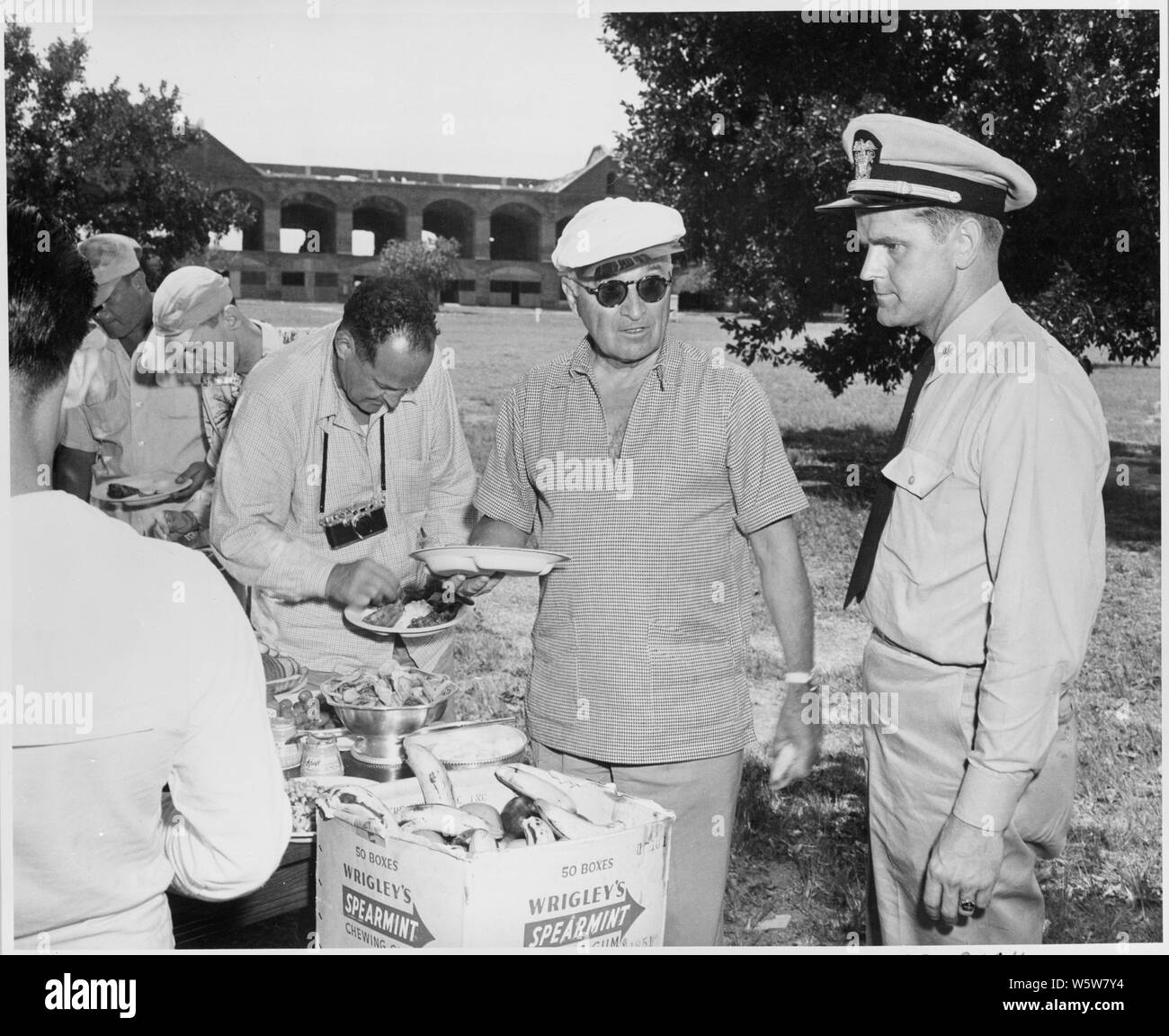 Photograph of President Truman serving himself a picnic lunch during ...