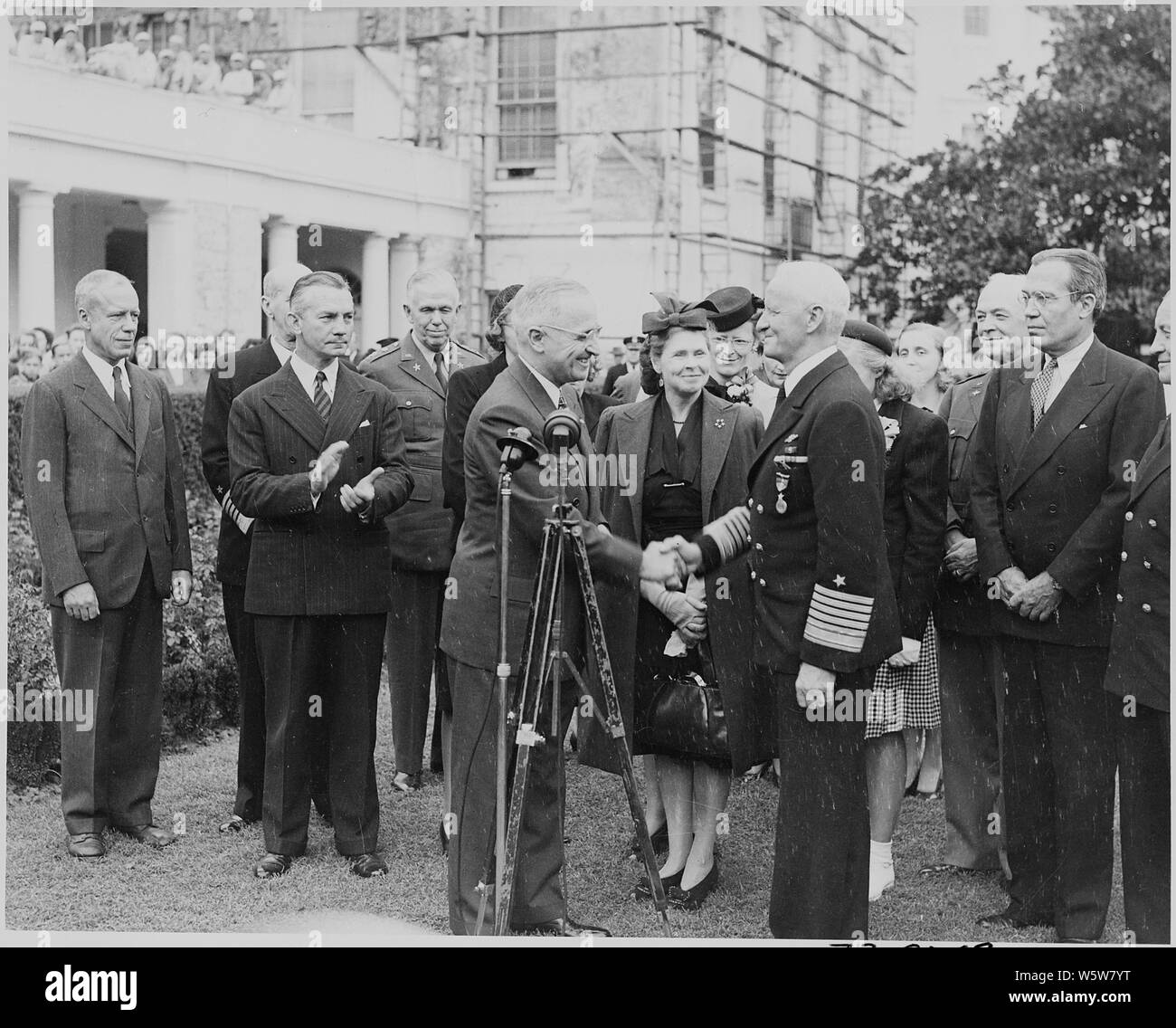 Photograph of President Truman shaking hands with Admiral Chester ...
