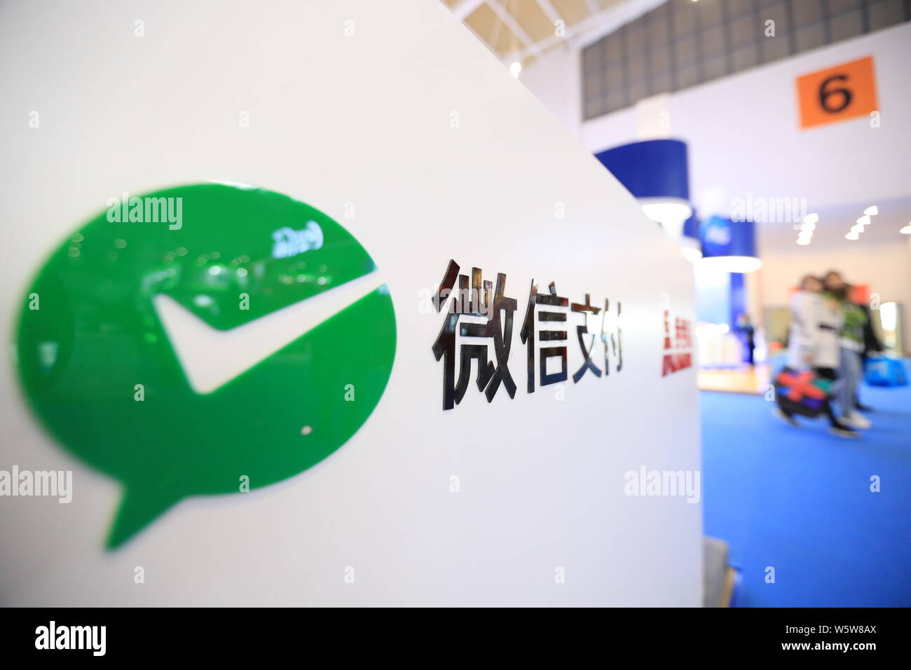 --FILE--A logo of WeChat Pay is seen at the stand of Tencent during an ...