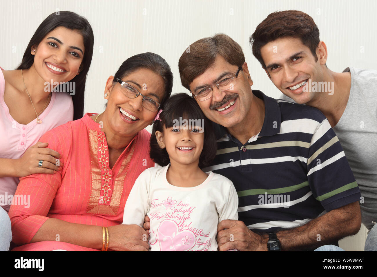 Portrait of an Indian multi-generation family smiling Stock Photo - Alamy