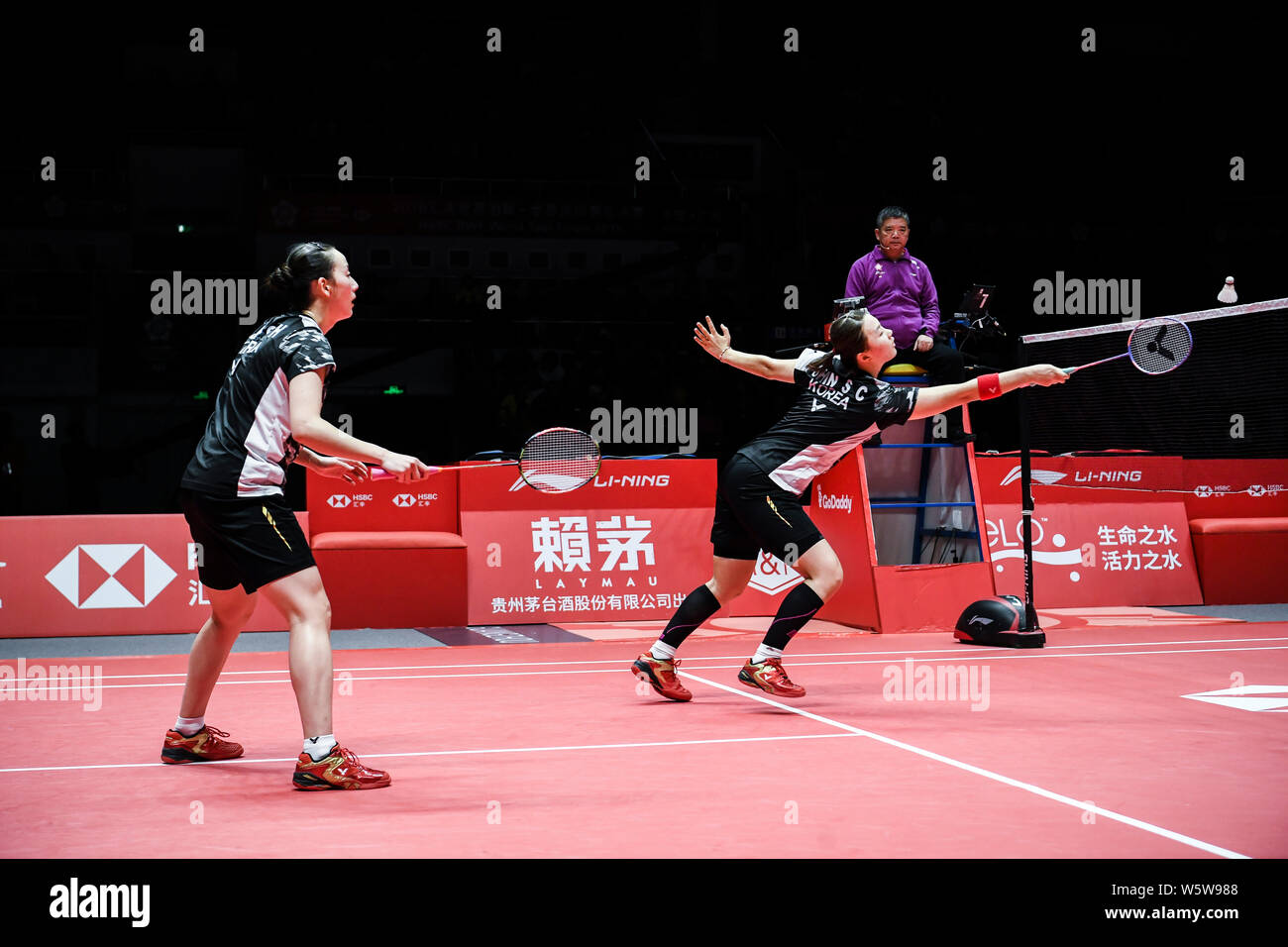 Lee So-hee/Shin Seung-chan of South Korea return a shot to Misaki ...