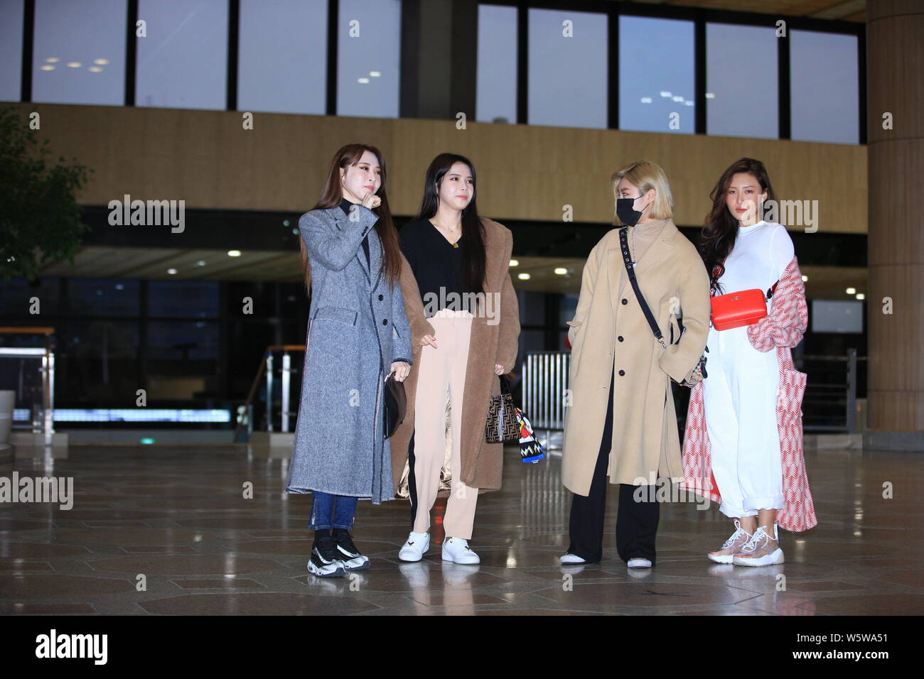 Members of South Korean girl group Mamamoo arrive at the Gimpo ...