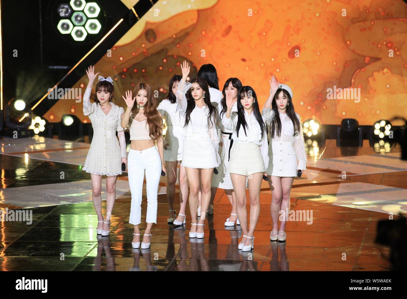 Members of South Korean girl group Gugudan perform during the South Korean music TV series "The ...