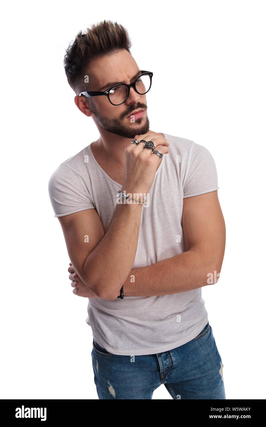side view of a young cool man thinking on white backround Stock Photo ...