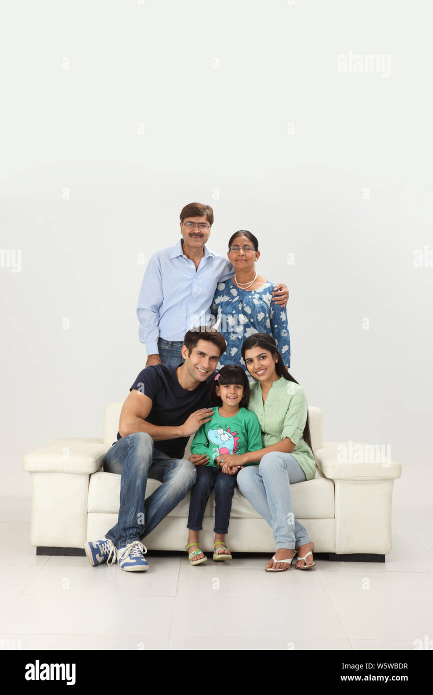 Family at home Stock Photo - Alamy