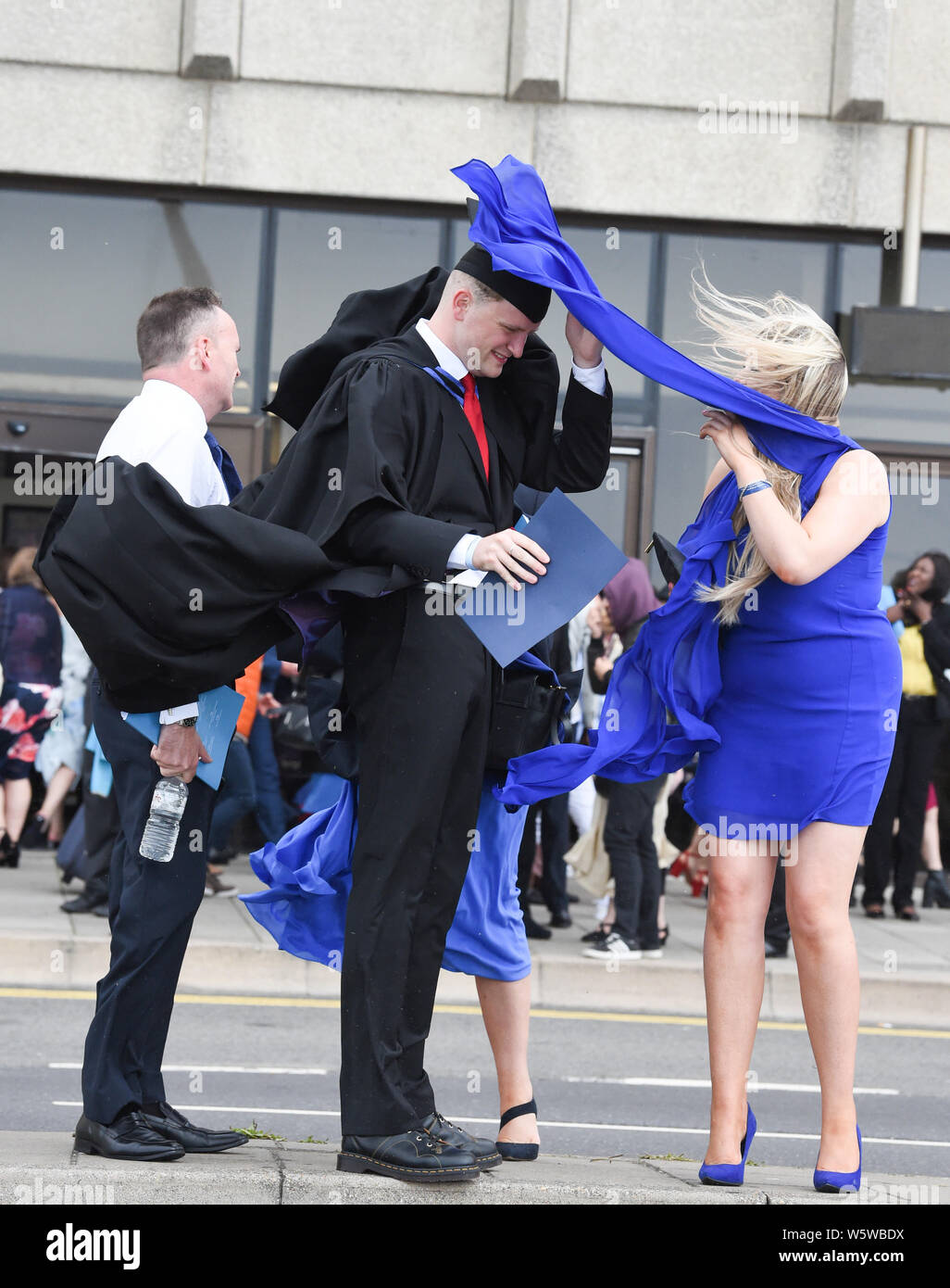 Brighton, UK. 30th July, 2019. Students with friends and family ...