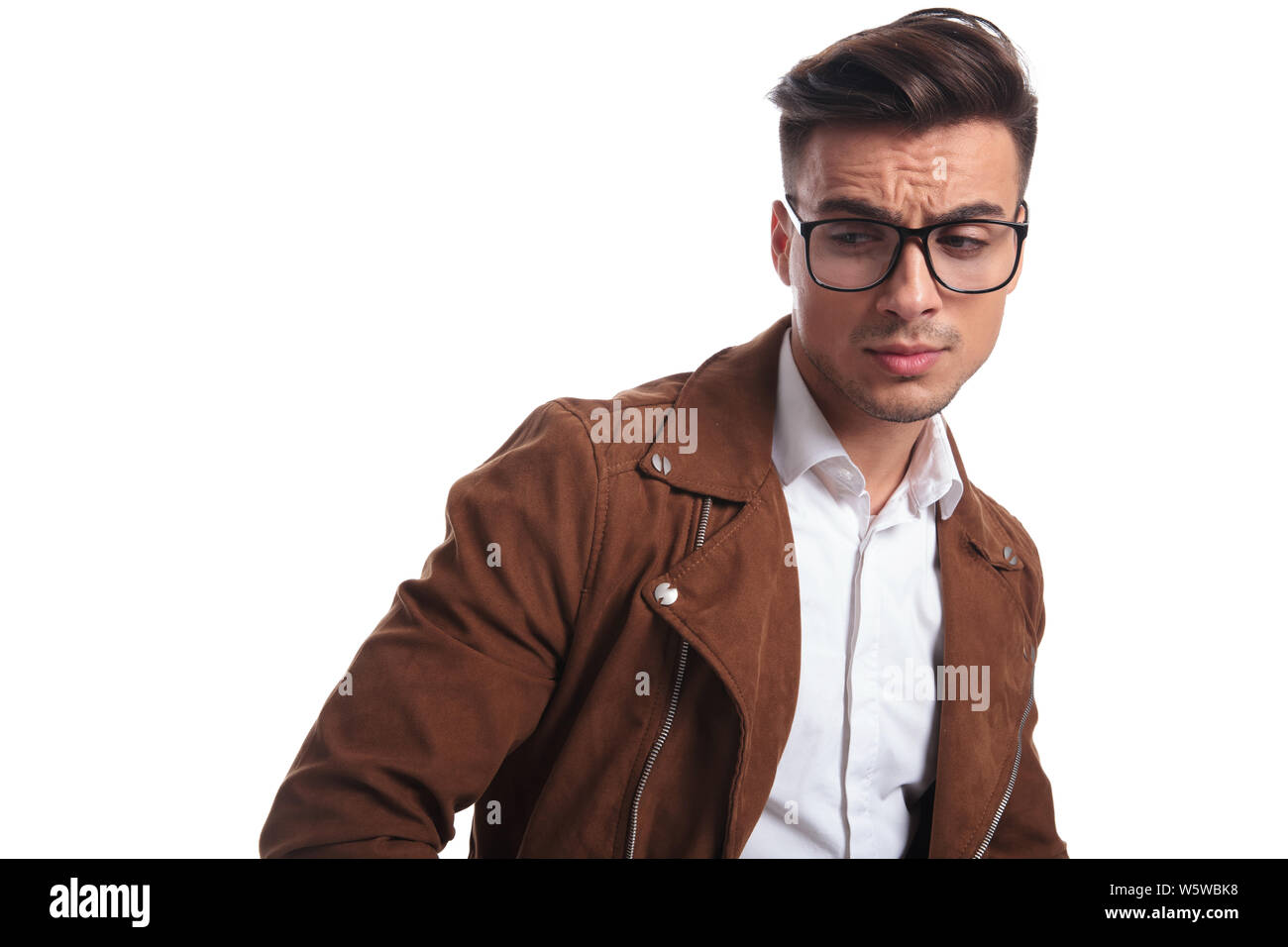 sad casual man in leather jacket and glasses on white background Stock ...