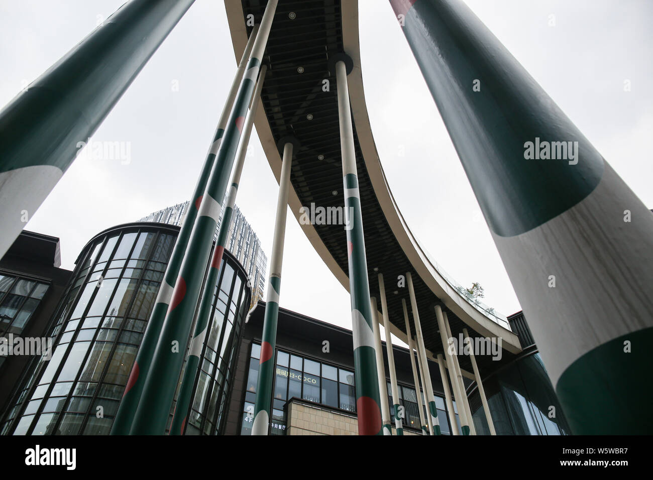 A new 10-meter-high pedestrian overpass supported by 19 slim columns ...