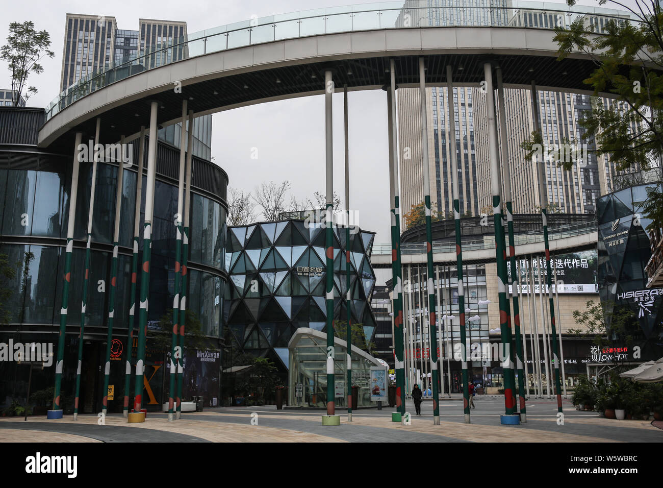 A new 10-meter-high pedestrian overpass supported by 19 slim columns ...