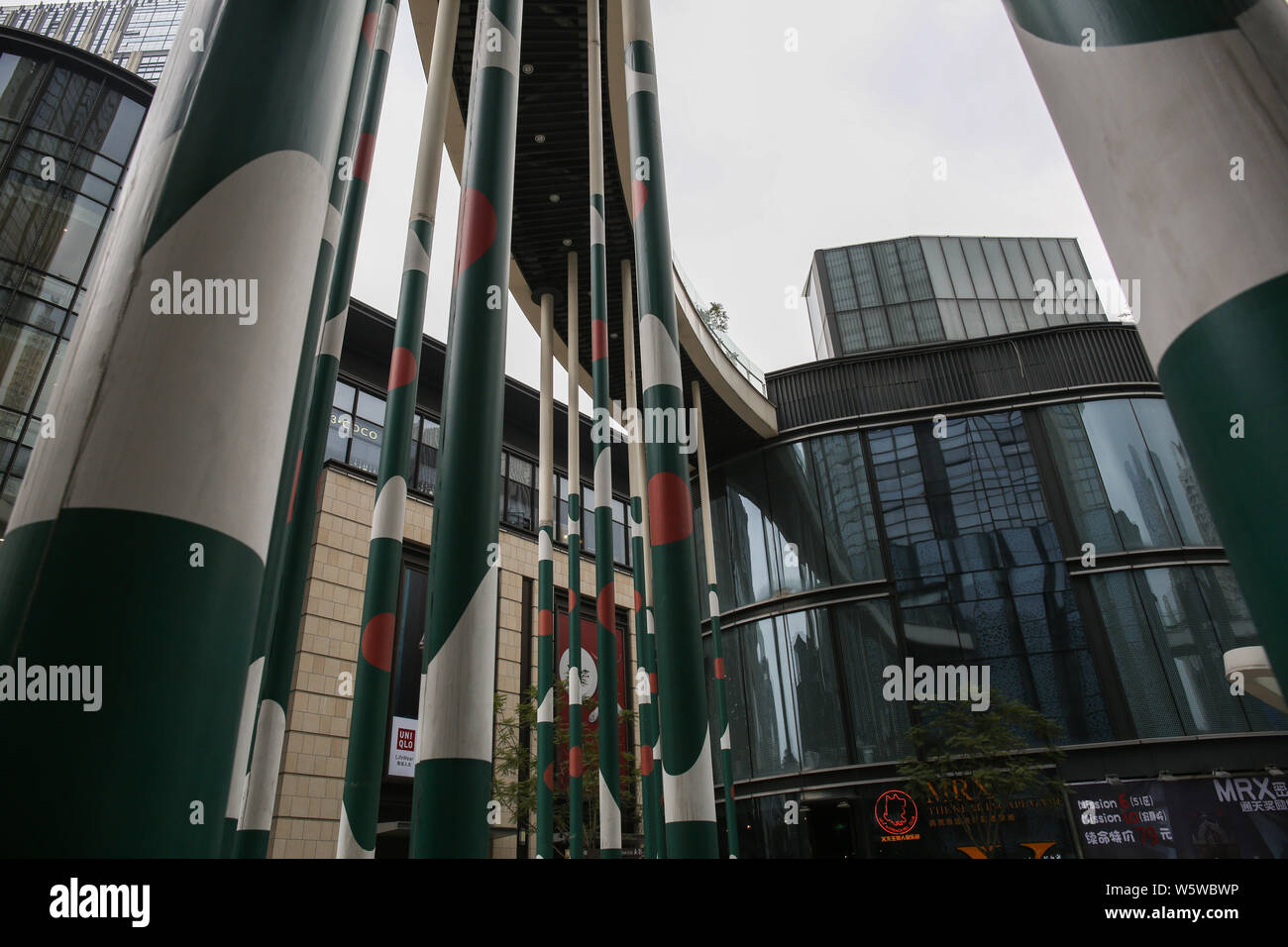 A new 10-meter-high pedestrian overpass supported by 19 slim columns ...