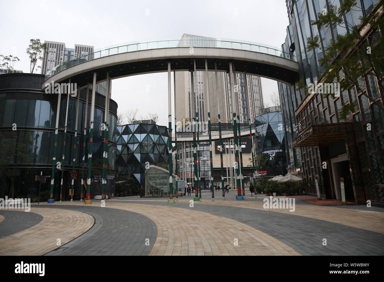 A new 10-meter-high pedestrian overpass supported by 19 slim columns ...