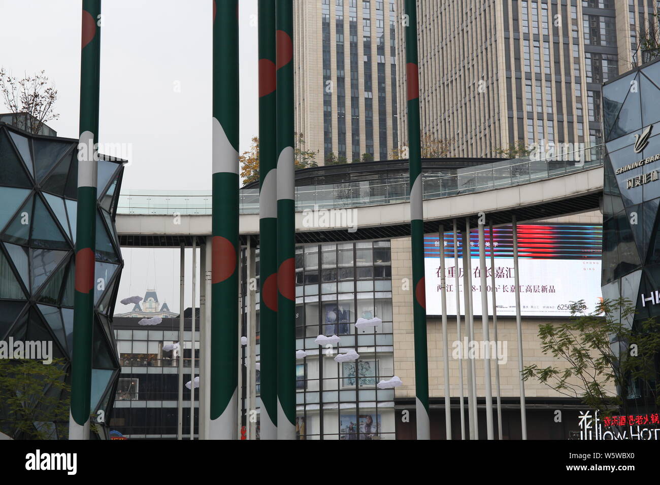 A new 10-meter-high pedestrian overpass supported by 19 slim columns ...