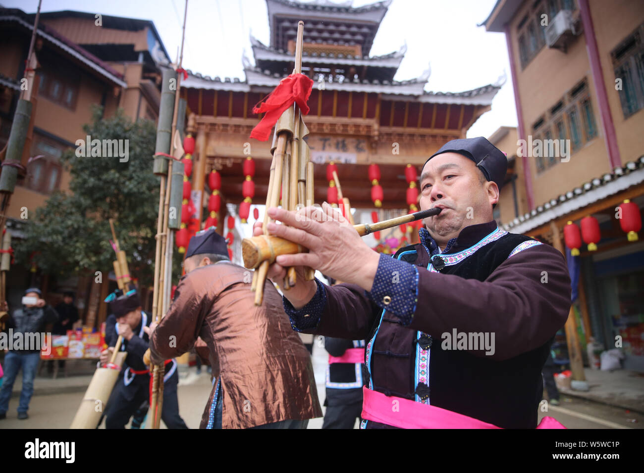 Chinese people of Dong ethnic group dressed in traditional silver ...