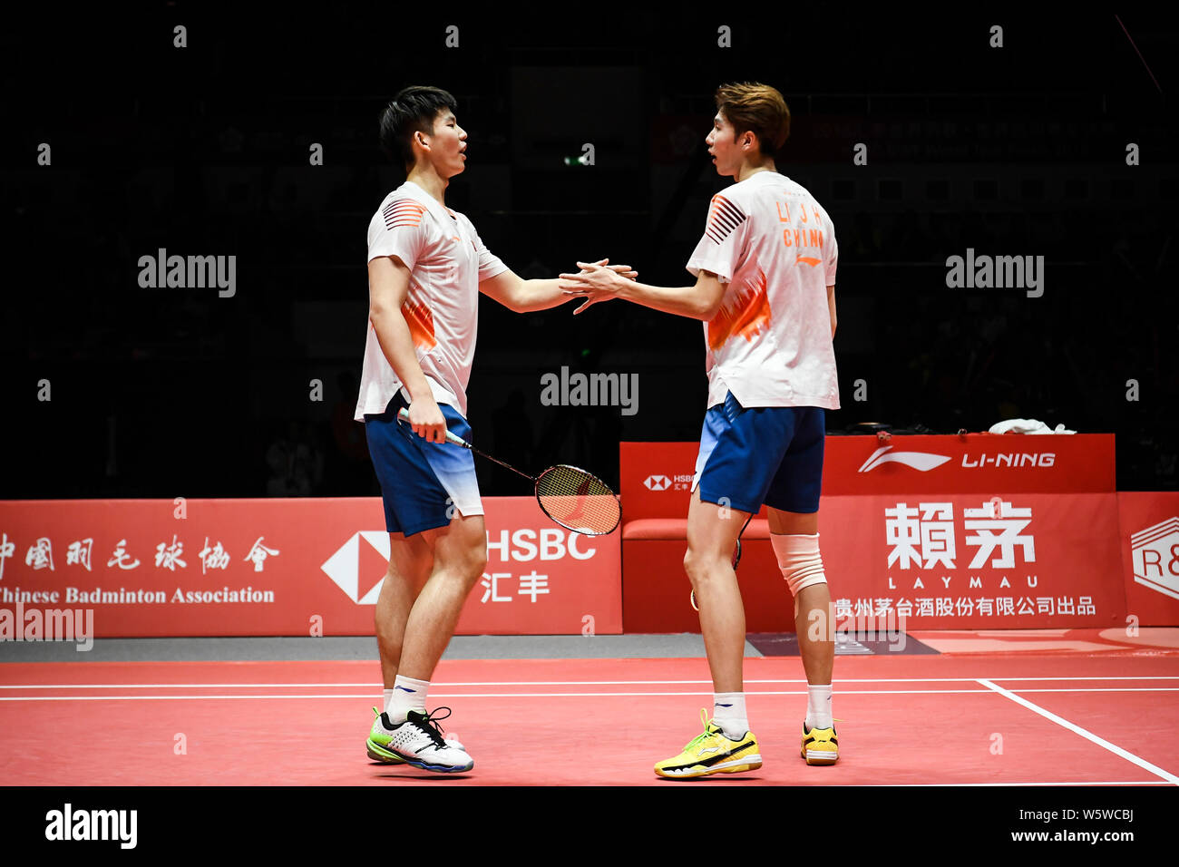 Li Junhui and Liu Yuchen of China celebrate after scoring against ...