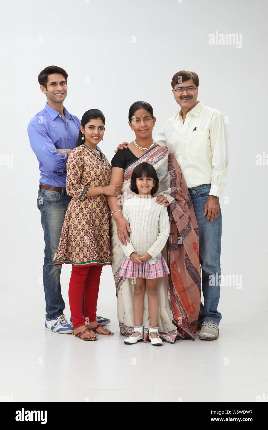 Family standing together Stock Photo - Alamy
