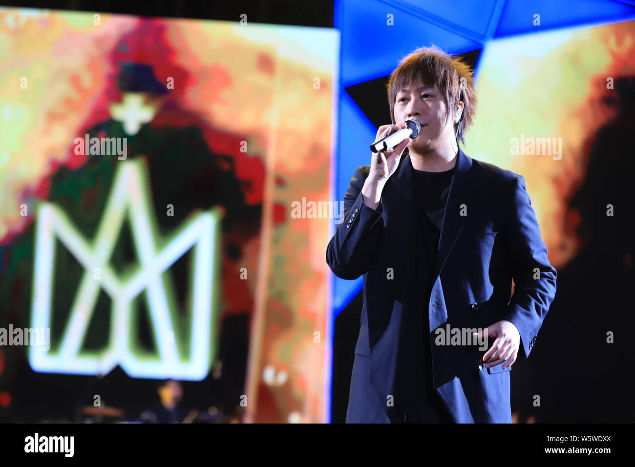 Chen Hsin-hung, better known by his stage name Ashin, of Taiwanese rock band Mayday, performs ...