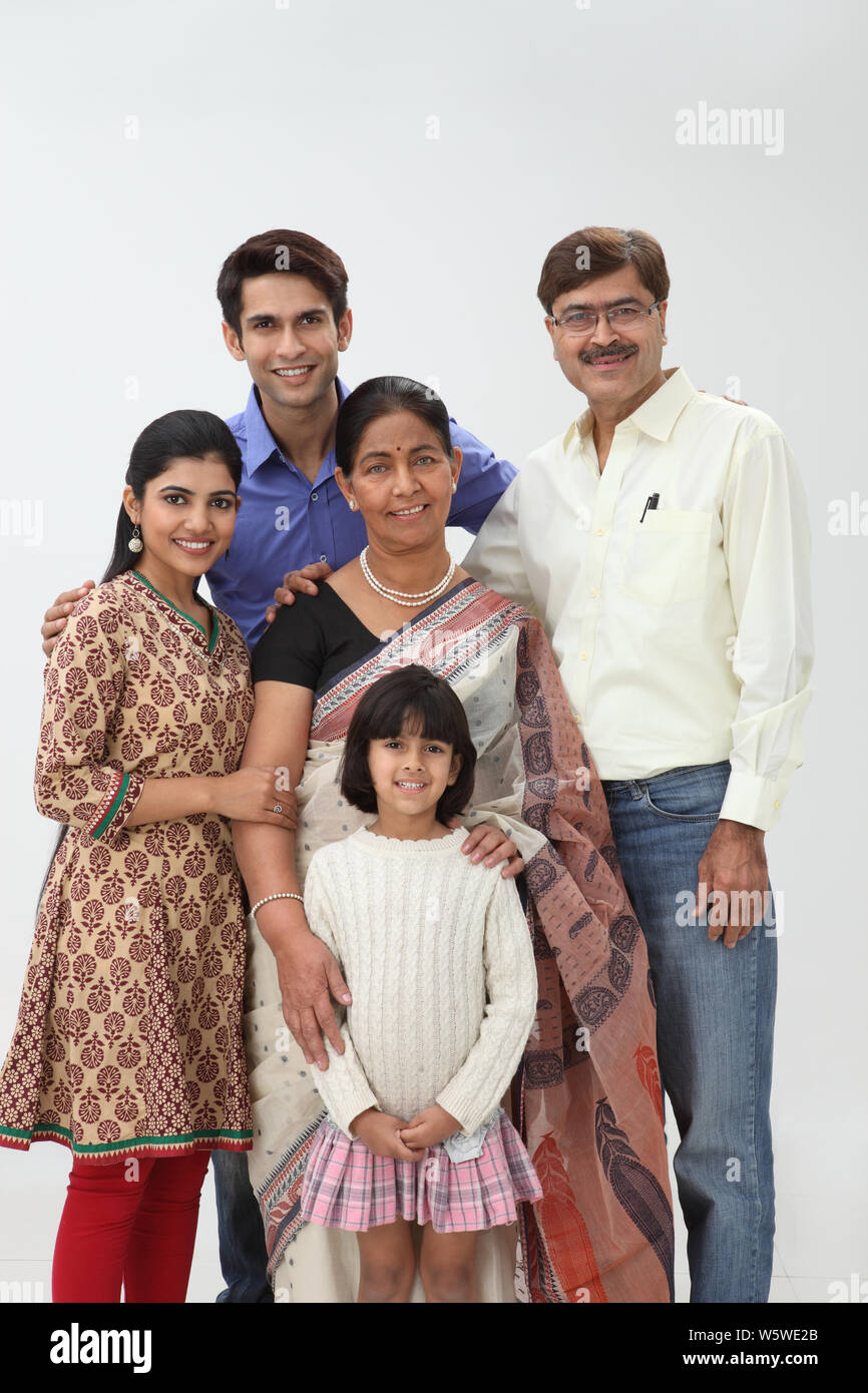 Family standing together Stock Photo - Alamy