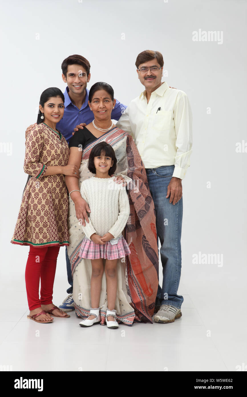 Family standing together Stock Photo - Alamy