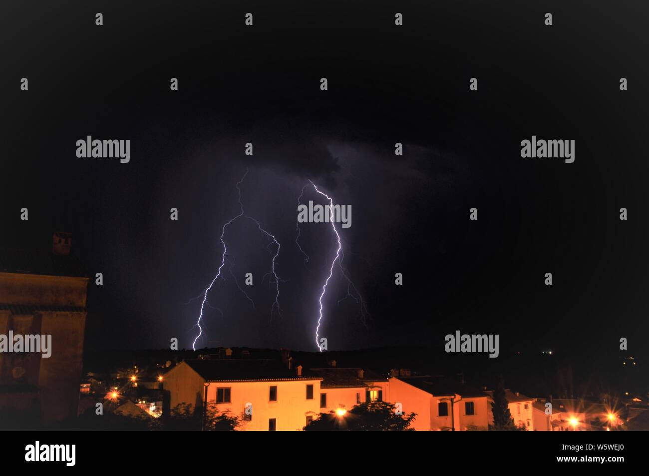 thunderstorm and stormy clouds with rain in the night Stock Photo - Alamy