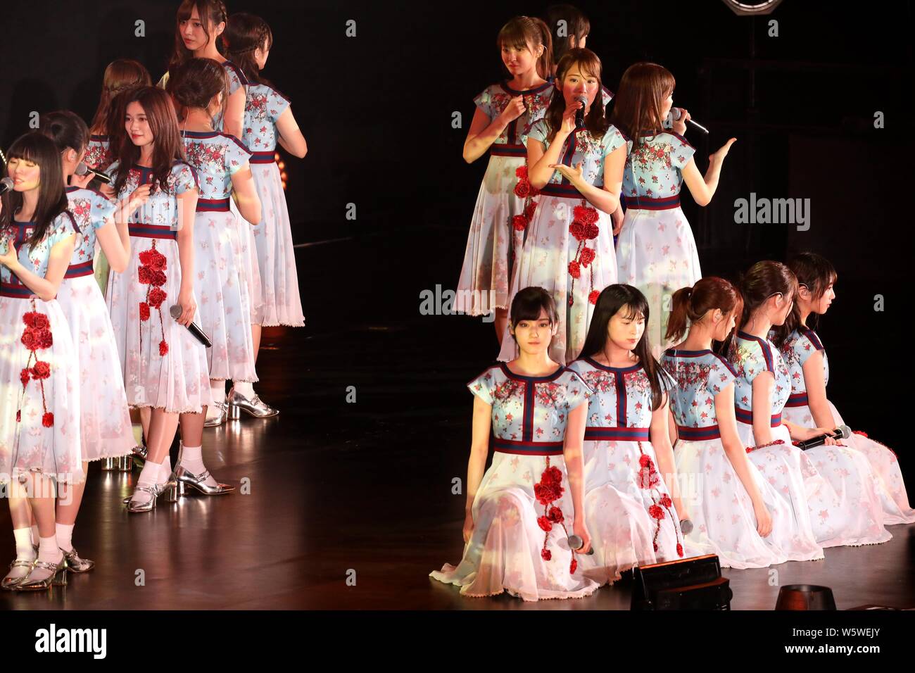 Members of Japanese girl idol group Nogizaka46 perform during their ...