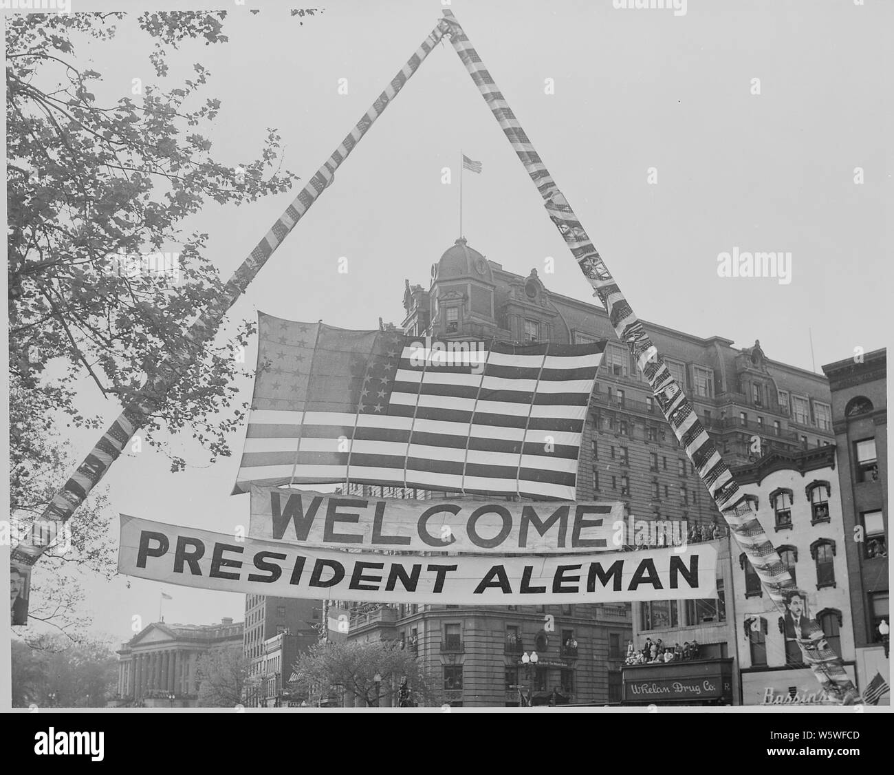 Photograph of U.S. flag and welcoming banner hung over a Washington ...