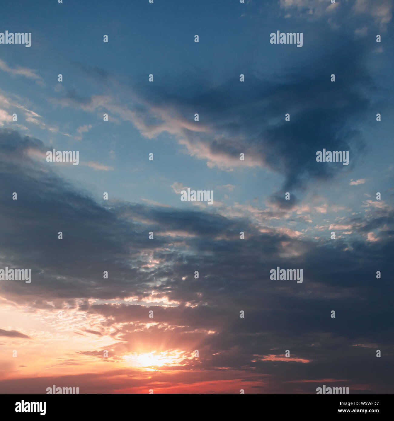 Cloudy sky at sunset, natural square background photo Stock Photo - Alamy