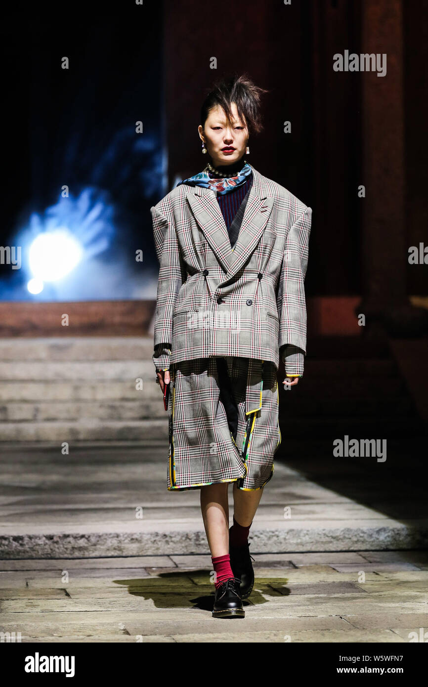 A model displays a new creation during the OPPO Fantasy New Year Big ...