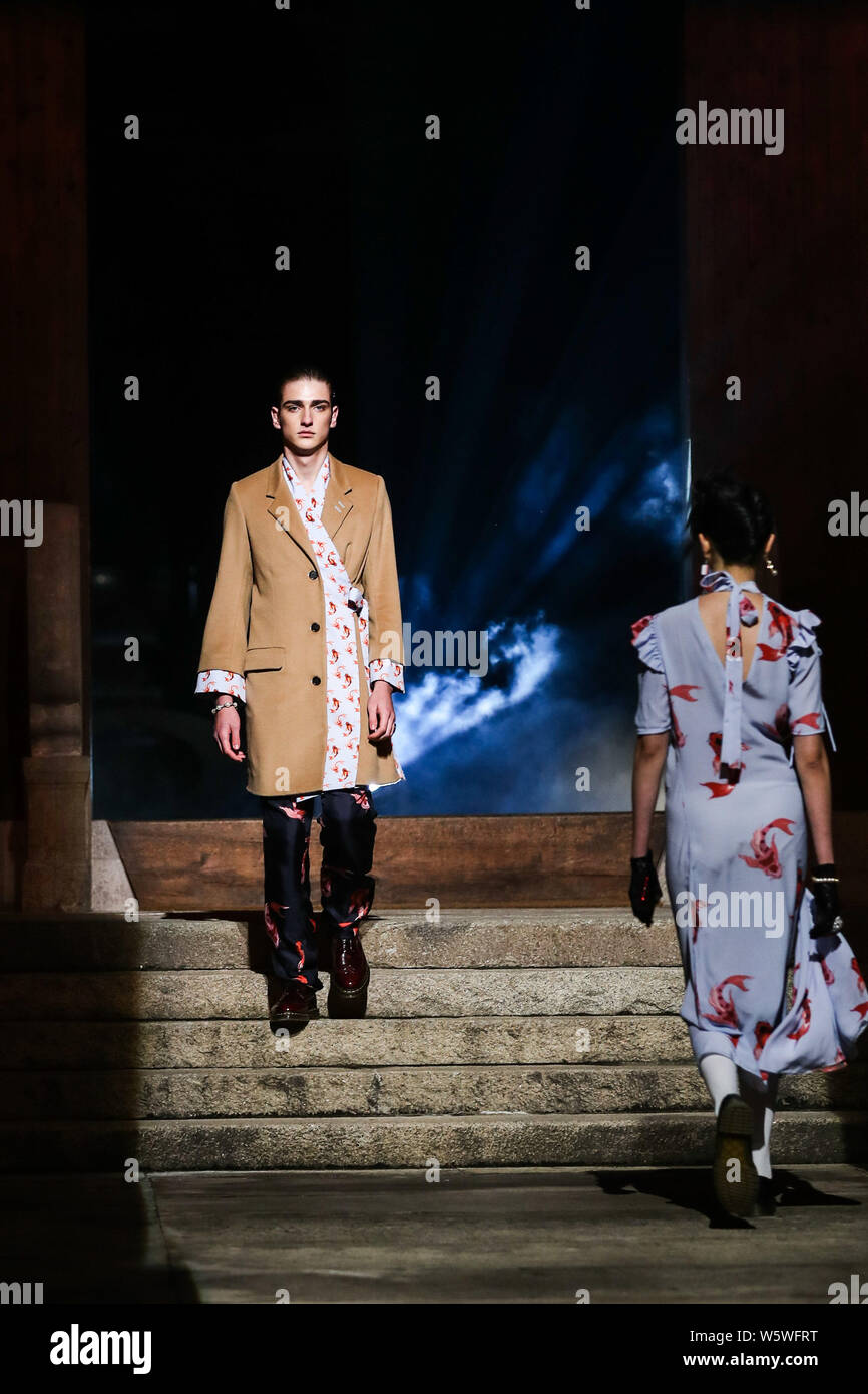 A model displays a new creation during the OPPO Fantasy New Year Big ...