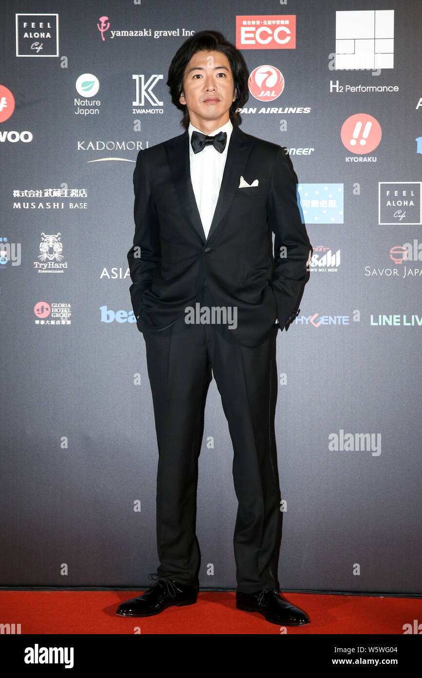 **TAIWAN OUT**Japanese actor and singer Takuya Kimura poses as he ...