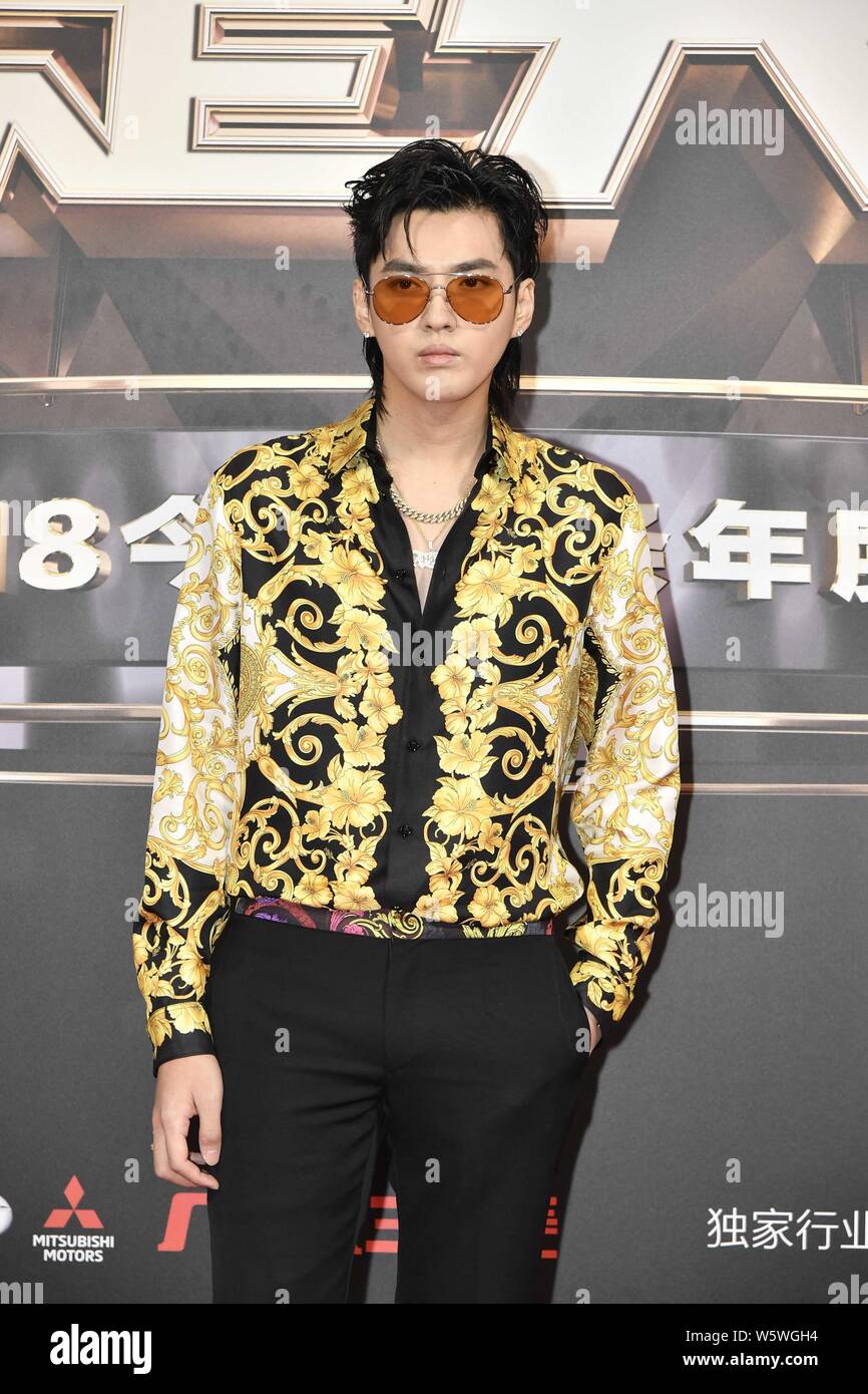 Chinese singer and actor Kris Wu or Wu Yifan poses as he arrives at the ...