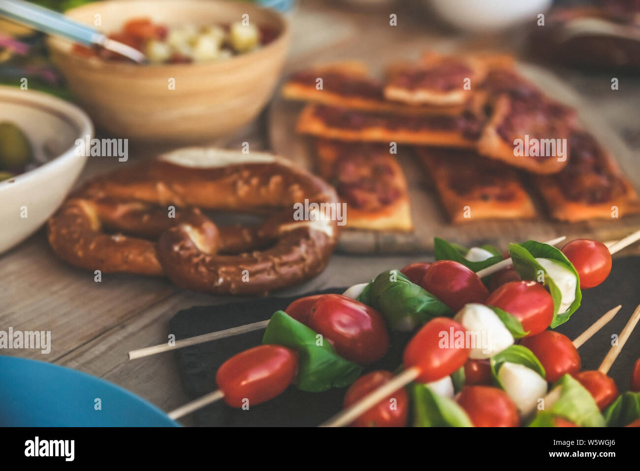 Close up view of many foods on a wooden table. Viande multicolor ready ...