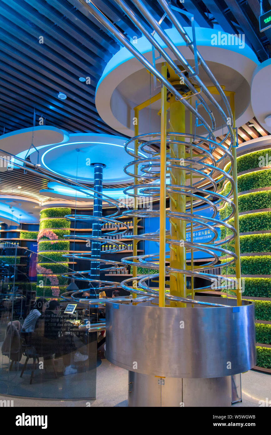 Customers dine in the world's tenth and Asia's third spaceship-themed ...