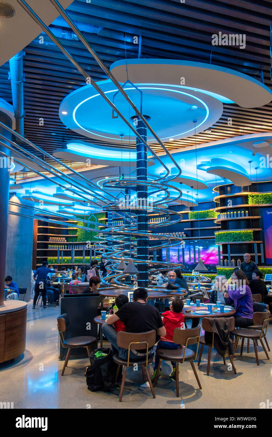 Customers dine in the world's tenth and Asia's third spaceship-themed ...