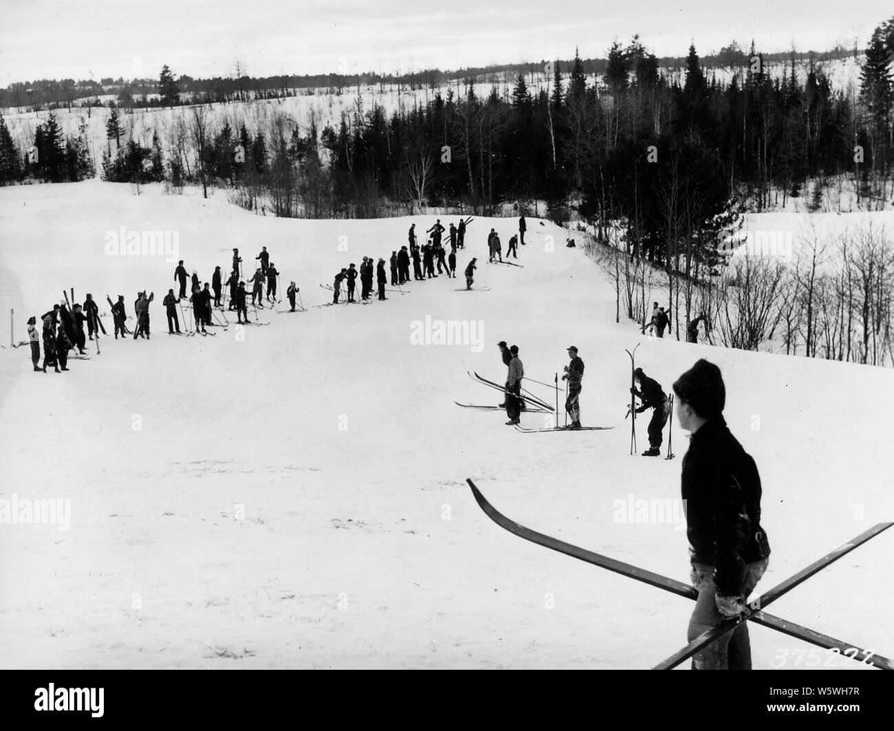 Photograph of a Line-Up of Winter Sports Fans; Scope and content ...