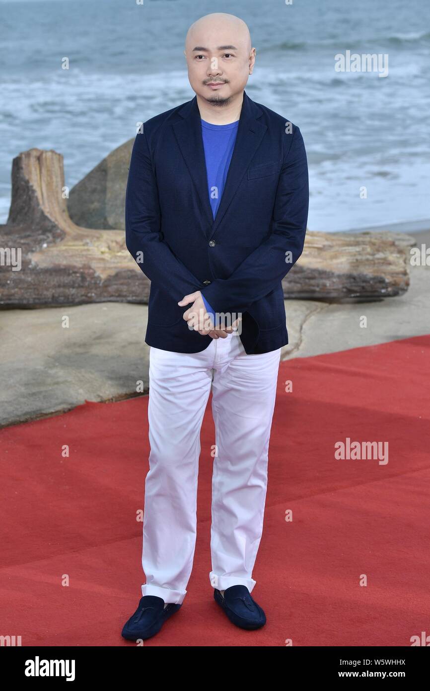 Chinese actor Xu Zheng arrives on the red carpet for the closing ...