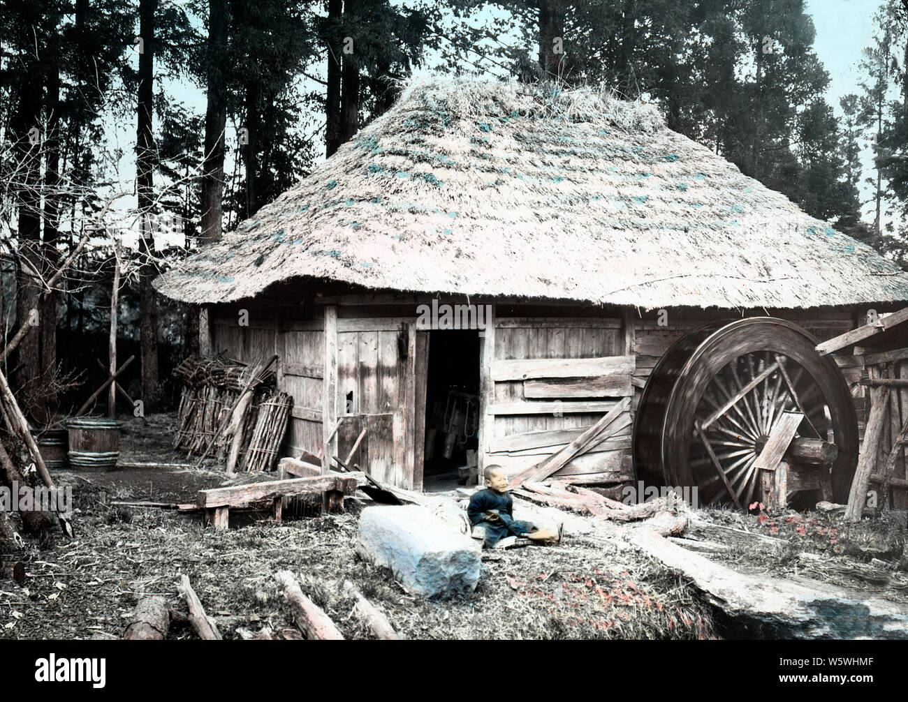 [ 1890s Japan - Japanese Waterwheel ] — A house with a thatched roof ...